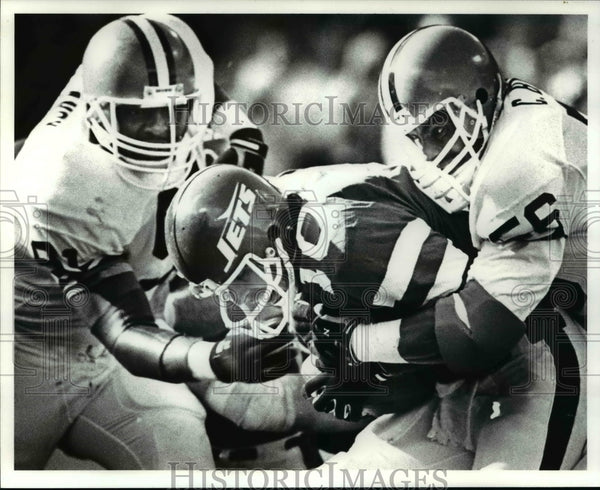 Press Photo Chip Banks and Sam Clancy vs Pat Ryan-football action ...