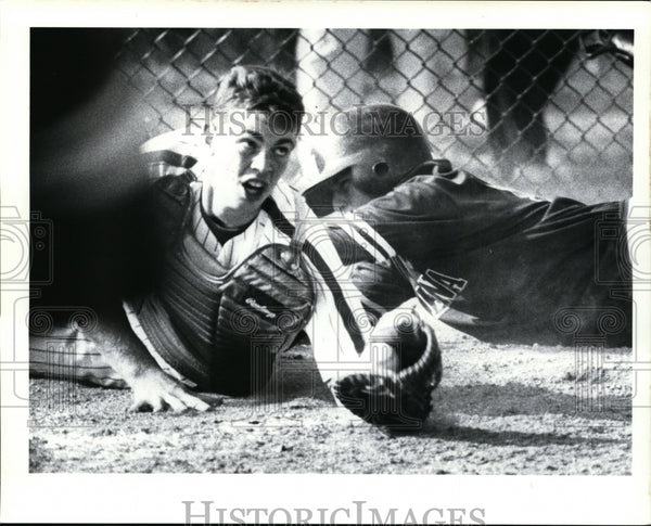 Press Photo Brunswick catcher jeff Schuster looks to the umpire for th ...