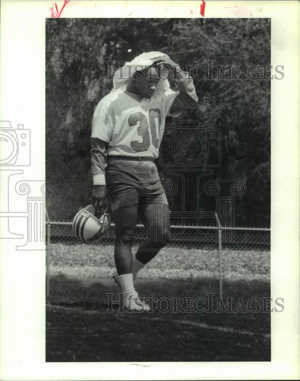 1989 Press Photo Houston Oilers football running back Mike Rozier towe ...