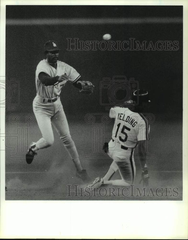 1990 Press Photo Houston Astros baseball player Eric Yelding is out at ...