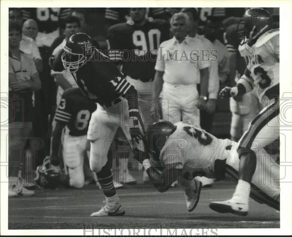 1987 Press Photo U of Houston football quarterback Andre Ware is ...
