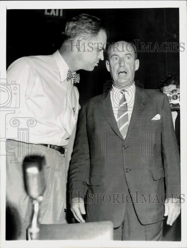 1956 Press Photo Governor Mennen Williams of Michigan shown another man ...