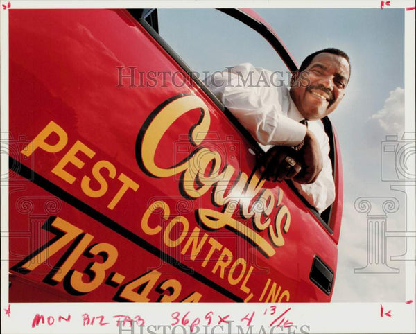 1994 Press Photo Charles Coyle with his Coyle's Pest Control truck in ...