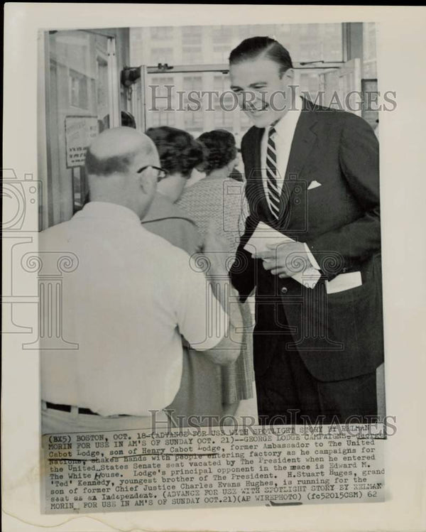 1962 Press Photo George Cabot Lodge greets people entering factory in ...