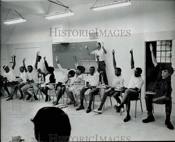 1969 Press Photo Upward Bound students and teacher with hands raised ...