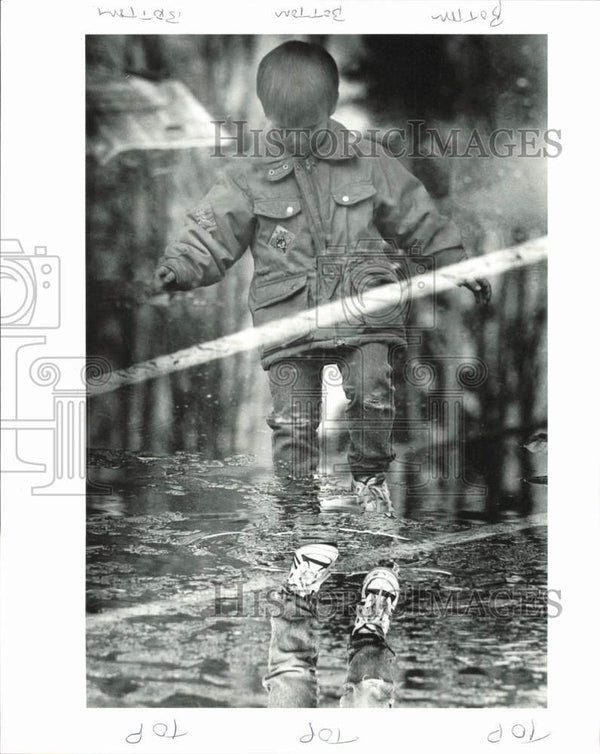 1989 Press Photo Adam Shaughnessy tiptoes through water at Homestead ...