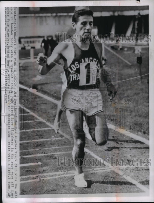 1982 Press Photo Los Angeles Track Star Jim Beatty won a mile run at ...