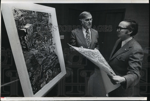 1973 Press Photo Robert Ertl and Michael Crowley study a Milwaukee Area ...