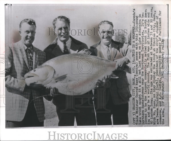 1961 Press Photo George Hees, Trade Minister with 102-pound Lake Trout ...