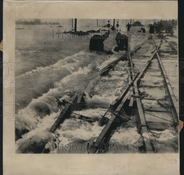1953 Press Photo Japanese Workmen lash Railroad Tracks in Flooded ...