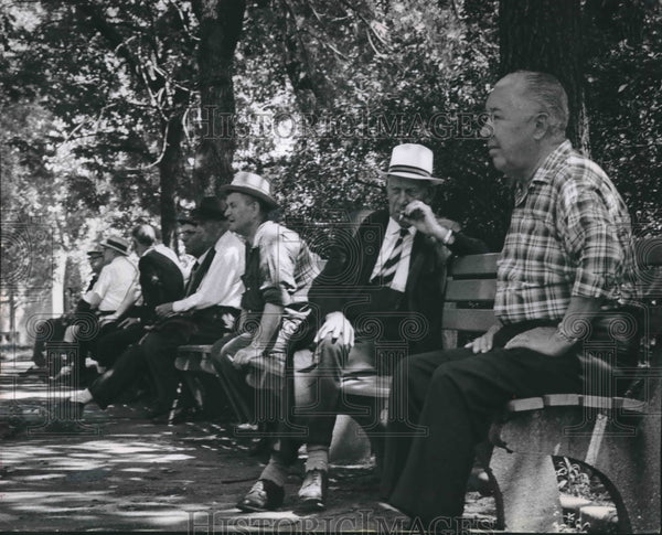 1964 Press Photo Men Sit And Chat On The Benches In Red Arrow Park ...