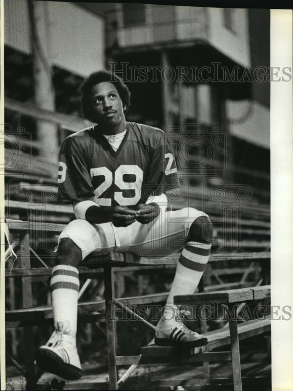 1979 Press Photo Football player Greg (Grape Juice) Johnson sits in the ...