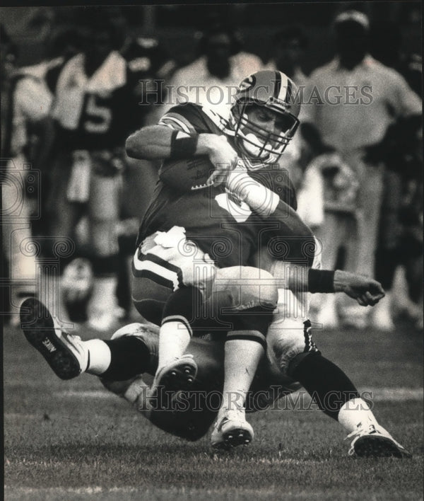 1990 Press Photo Green Bay Packers football's Anthony Dilweg sacked ...