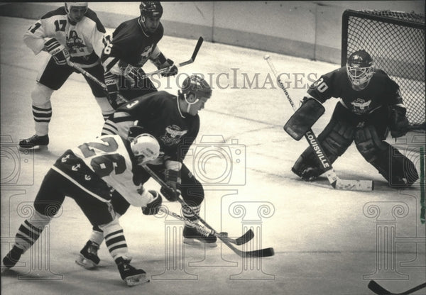 1986 Press Photo Kevin Schamehorn, Admirals, Eric Germain, Flint battle ...