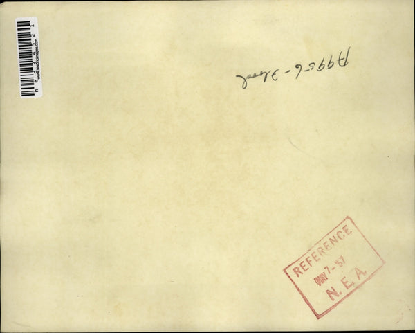 1957 Press Photo Man caught by the rising San Gabriel Rivers in Texas ...