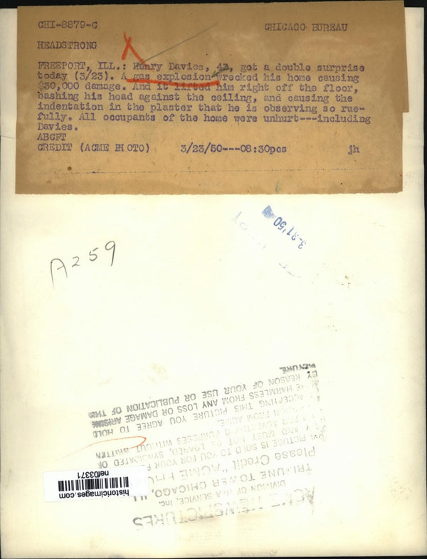 1950 Press Photo Henry Davison examines hole in ceiling where he hit ...