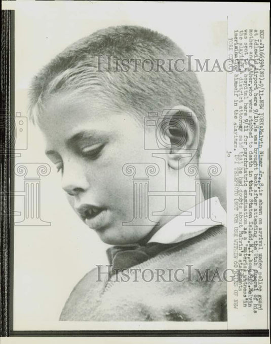 1958 Press Photo Melvin Nimer, Jr., under police guard at Idlewild ...