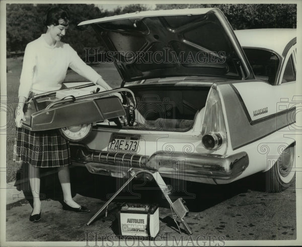 Press Photo Loading a Babco Electric Caddy Cart in Auto - nes55423 ...