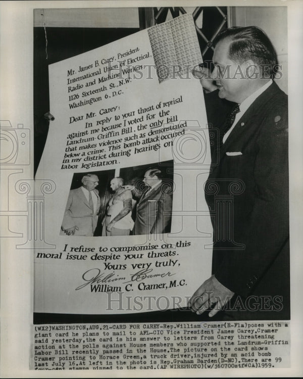 1959 Press Photo Rep. William Cramer poses with card he sent to Vice ...