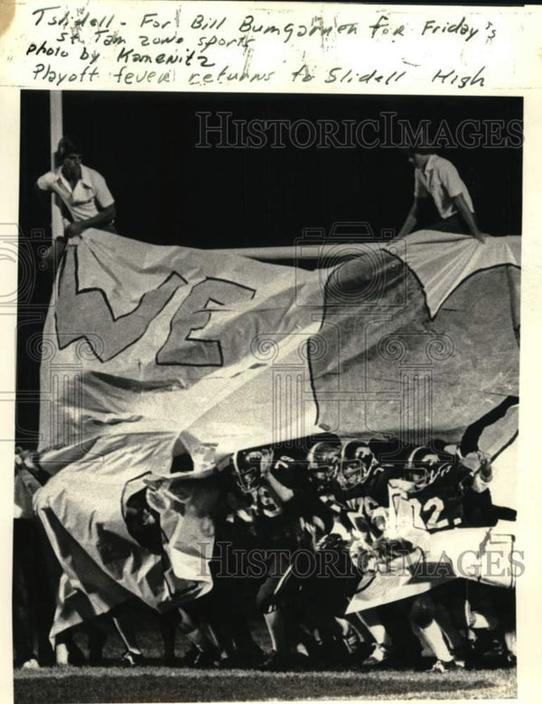 1982 Press Photo Slidell High Tigers enterring the football field ...