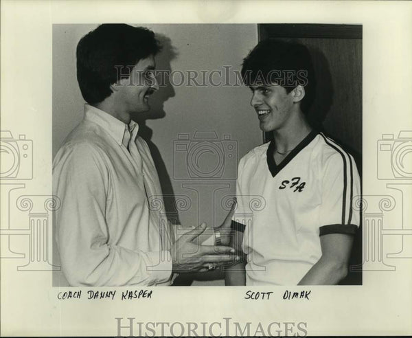 Press Photo Coach Danny Kaspar shakes Scott Dimak's hand - noc67992 ...