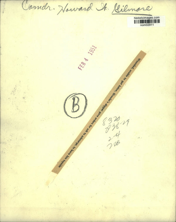 1951 Press Photo Commander Howard Gilmore leaves topside on a submarine ...