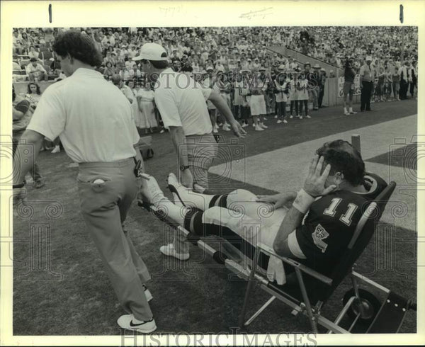 1989 Press Photo Injured New Orleans Saints football player John ...