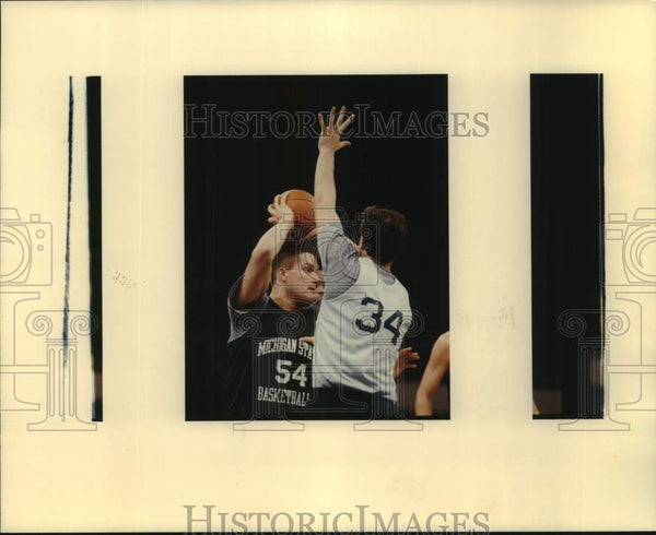 1990 Press Photo Michigan State basketball players Mike Peplowski, Dave ...