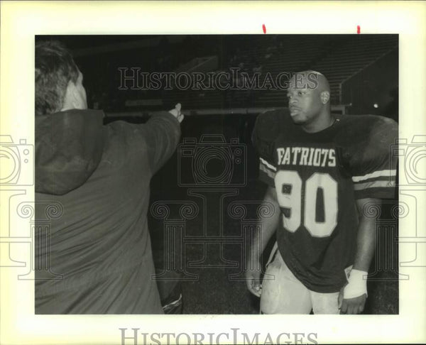 1989 Press Photo John Curtis football linebacker Bobby Powers listens ...
