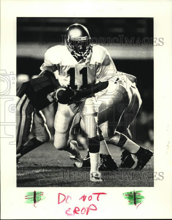 1990 Press Photo Higgins football quarterback Cedric Smith with the ...