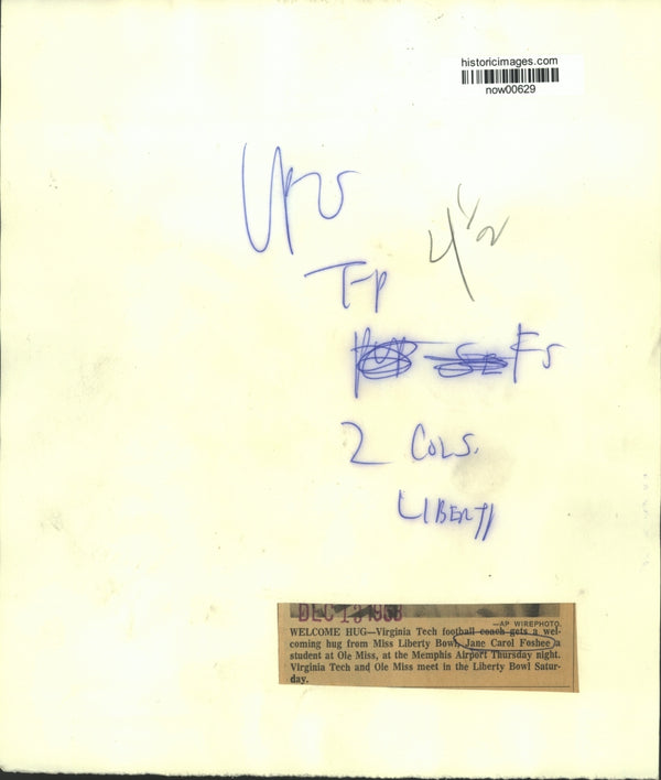 1968 Press Photo Virginia Tech football coach gets hug from Jane Carol ...