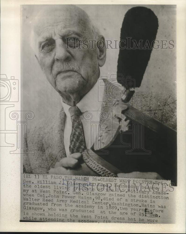 1964 Press Photo Oldest West Pointer Brig. General Glasgow holds dress ...