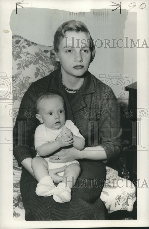 1958 Press Photo Mrs. Frank Harbison, Jr. carrying her son Frank III ...