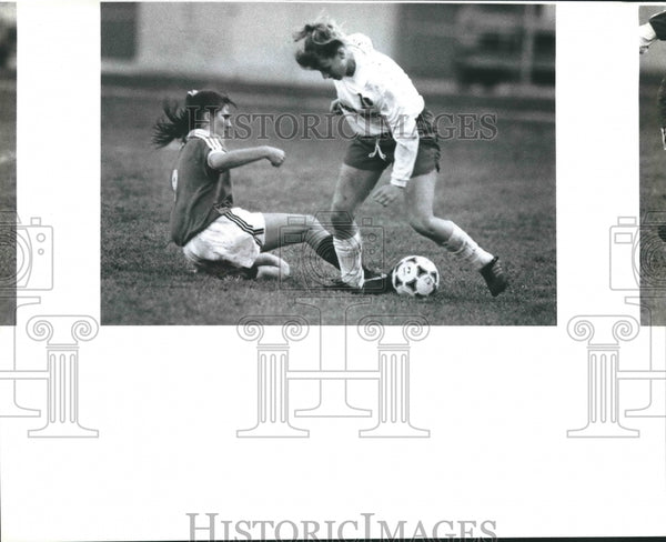 1990 Press Photo Madison soccer player takes ball from fallen Westwood ...