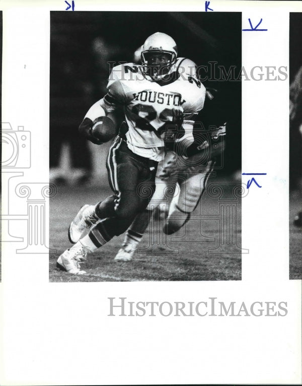 1991 Press Photo Vincent Yates cuts upfield Sam Houston vs East Central ...