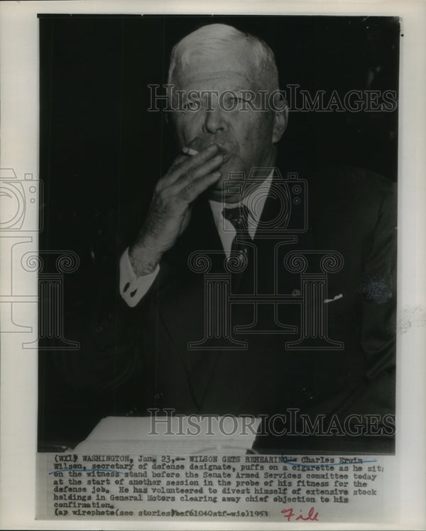 1953 Press Photo Secretary of Defense Designate Charles Wilson smokes ...