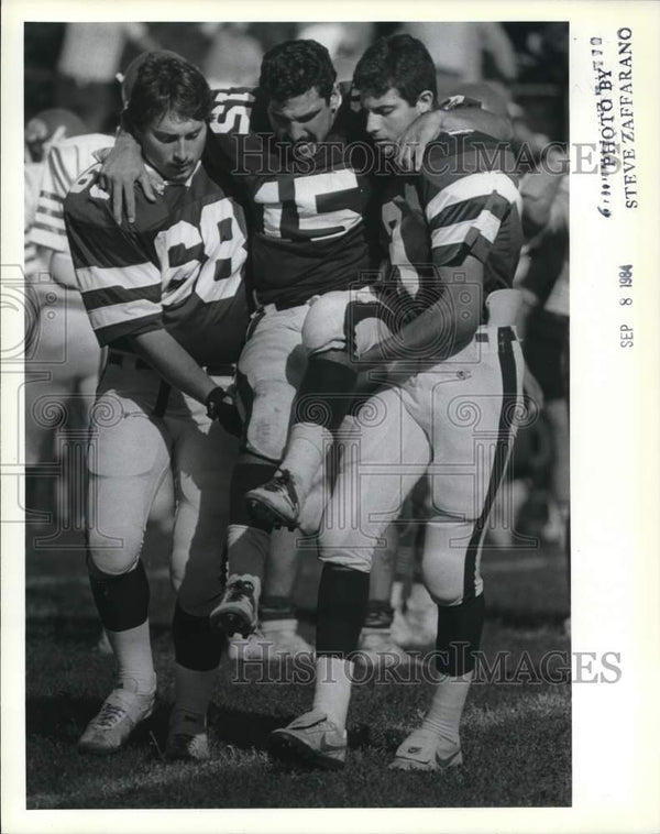 1984 Press Photo Wagner College Football Player Carried Off Field ...