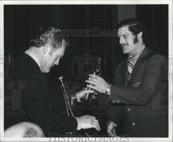 1972 Press Photo Colton football coach Steve Busch receives J. Fred Bo ...