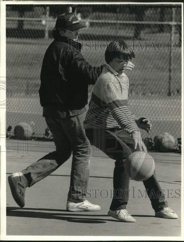 1987 Press Photo Jason Coleman and Joe Depew at MaChesney Park ...