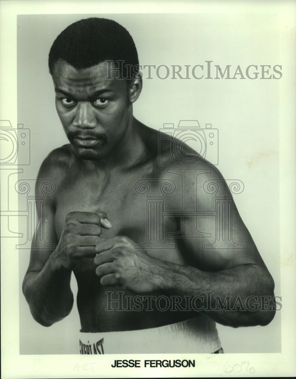 Press Photo Boxer Jesse Ferguson poses for photo with fists raised - t ...