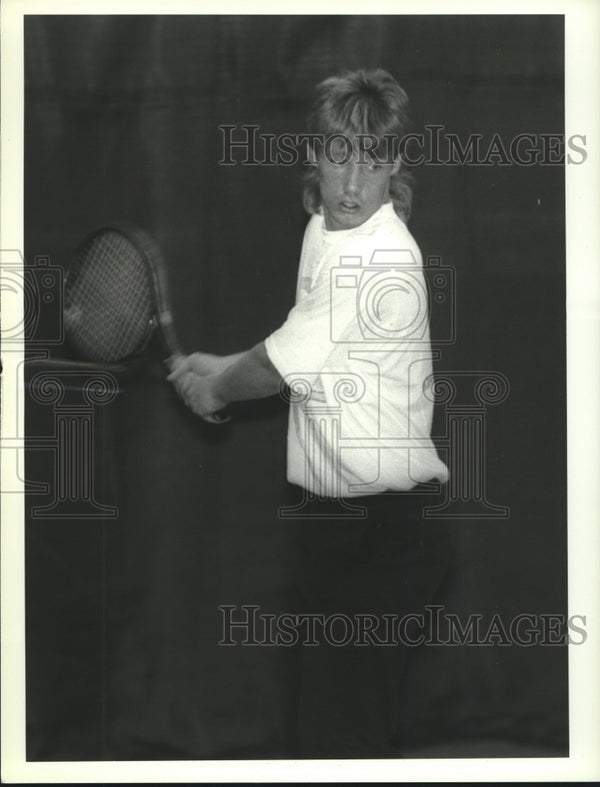 1989 Press Photo Tennis player Travis Boyd returns shot during match in ...