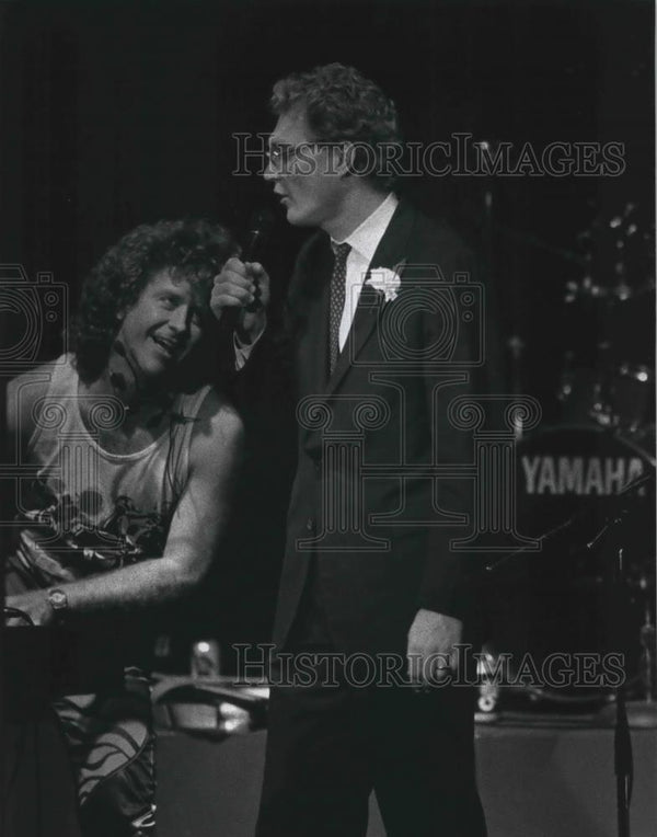 Pat Sheedy plays keyboard as Mayor Norquist sings, Wisconsin., 1989 ...
