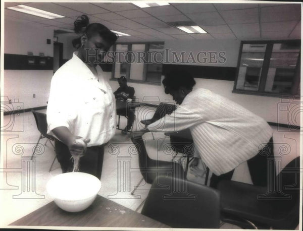 Lisa Parker, Keisha Carter, Hillside Terrace cleans club tables, 1993 ...
