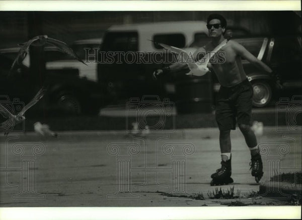 Mike Radtke skates on roller blades, Bradford Beach, Milwaukee, 1993 ...
