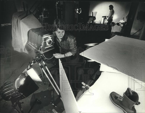 Photographer Betsy Maier of Pohlman Studio's, Inc. at work, 1983 ...