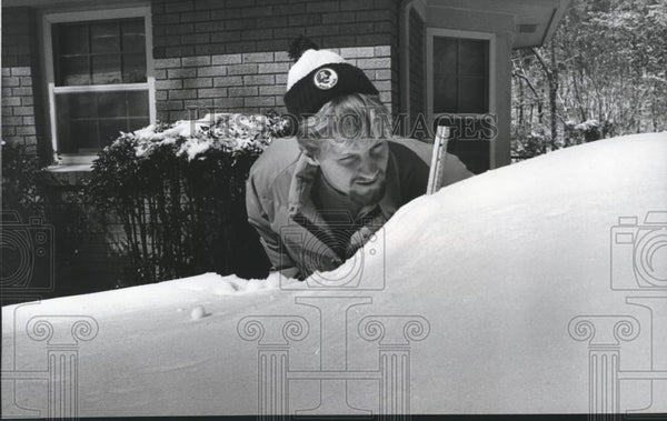 Jeff Newcomb measuring the snow on his car, Center Point, 1980 Vintage ...