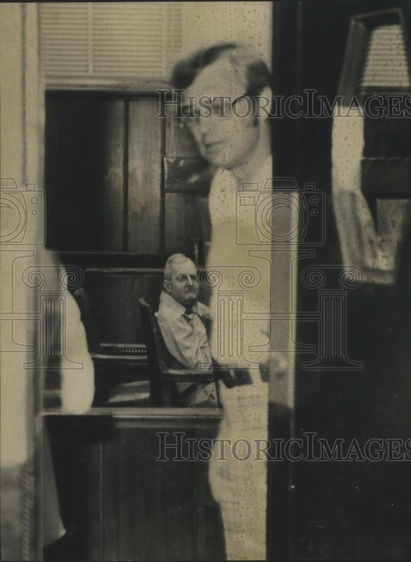 Hugh Otis Bynum, seated, peers toward courtroom door, 1978 Vintage ...