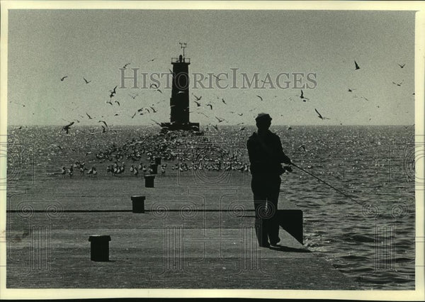 Donald Bonnell fishes off Sheboygan, Wisconsin's north pier, 1985 ...