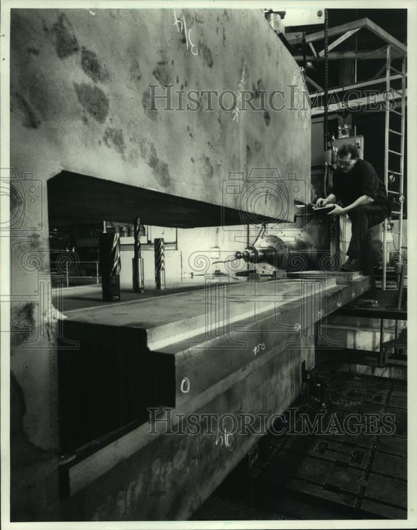 Superior Die Set employee Dave Bruski checks machine tool, 1991 vintage ...