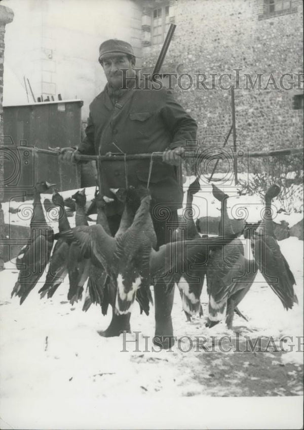 1956 Press Photo M. Marcel Firm and wild geese he hunted - Historic Images